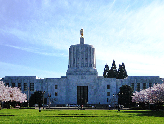 The Oregon State Capitol building stands majestically against blue skies - a reminder that important decisions happen in beautiful places too.