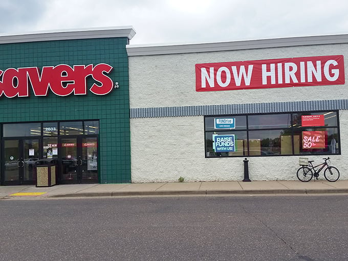 This Savers storefront might look simple, but inside lies a labyrinth of potential vintage finds and modern castoffs seeking second chances.
