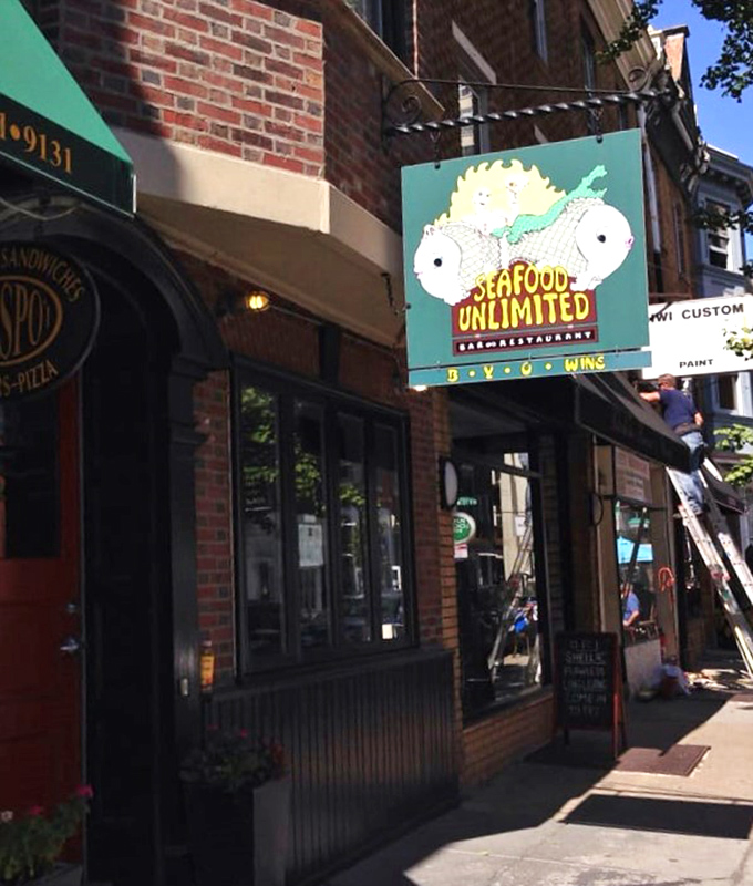 Window seats at Seafood Unlimited offer prime people-watching with your perfectly grilled catch. Rittenhouse Square's cozy seafood sanctuary.