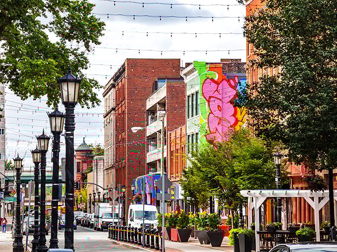 Vibrant street art brightens brick facades in a downtown where your Social Security check can actually cover more than just rent.