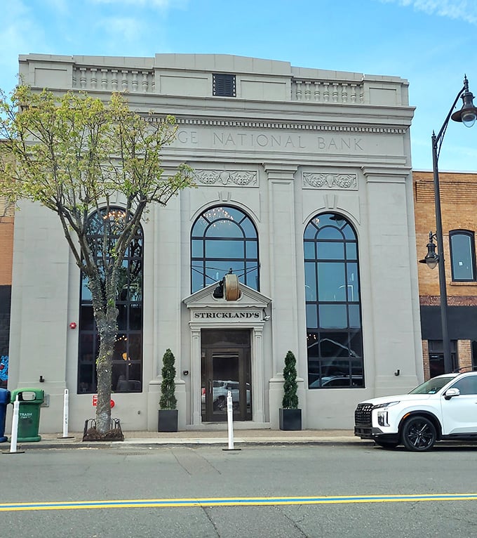 Banking on excellence! Strickland's preserved the architectural grandeur while creating a sanctuary for steak lovers.