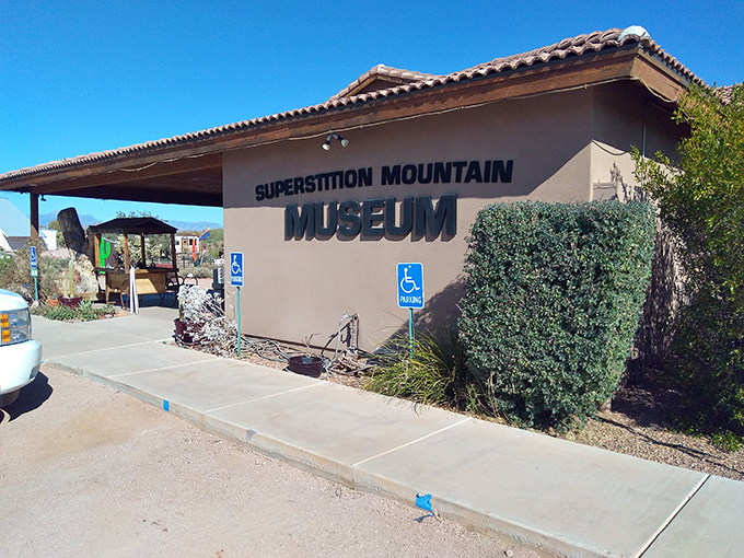 The terra-cotta roofed museum stands guard at the foot of mountains steeped in legends of lost gold and vanished prospectors.
