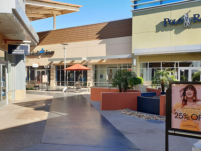 Polo Ralph Lauren's storefront basks in the Arizona sunshine, tempting passersby with promises of preppy treasures at prices that won't cause cardiac arrest.