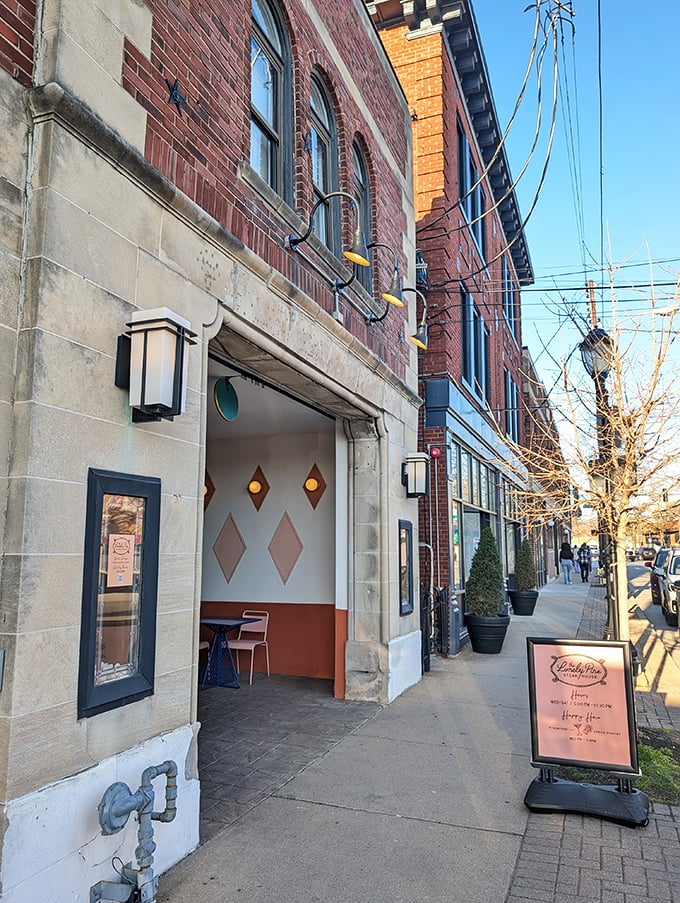 Warm lighting bathes the diamond-patterned alcove, creating the perfect mood for a steak date that'll make hearts flutter.