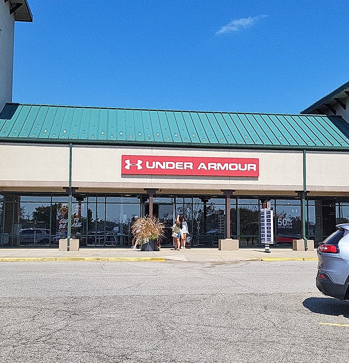 Finish Line, Claire's, and Guess storefronts stand ready for bargain hunters at Fremont's outlet paradise just off the highway.