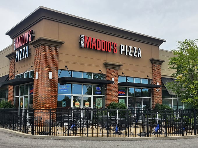 Those red umbrellas aren't just for show - they're signaling to pizza lovers that something special awaits inside.