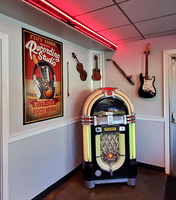 Where music meets mealtime! The vintage jukebox stands ready to provide the soundtrack to your dining experience while guitars keep watch from above.