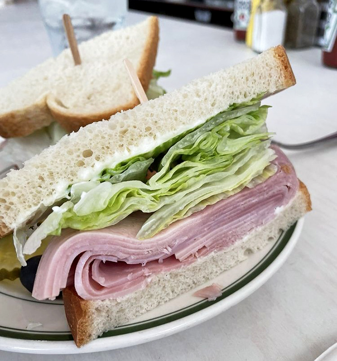 This Southern Baked Ham sandwich isn't trying to impress Instagram &ndash; it's too busy impressing your taste buds with thick-cut ham, crisp lettuce, and the perfect bread-to-filling ratio.
