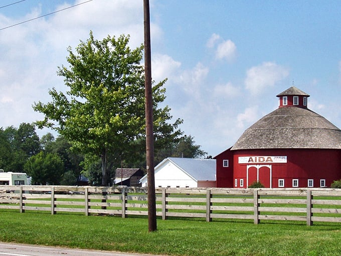The iconic red round barn at The Barns at Nappanee (formerly Amish Acres) stands as a beacon to food pilgrims seeking authentic Amish cooking and cultural immersion.