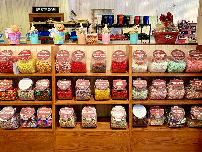 Candy bins lined up like a sugary color wheel&mdash;proof that organization can be beautiful when it involves jellybeans and chocolate-covered everything.