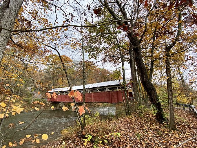 Nature frames her masterpiece in amber and gold. Even the trees seem to be showing off for this photogenic landmark.