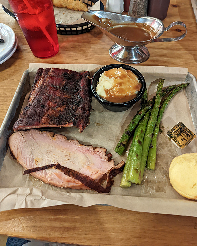 Behold the holy trinity of barbecue: perfectly smoked ribs, tender brisket, and sides worth writing home about.