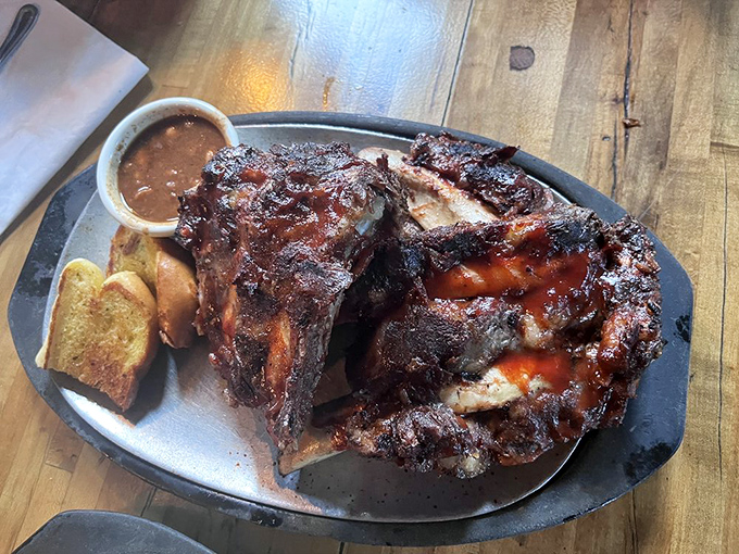 BBQ ribs that make you question your table manners. These fall-off-the-bone beauties are worth every napkin and the inevitable shirt stain.