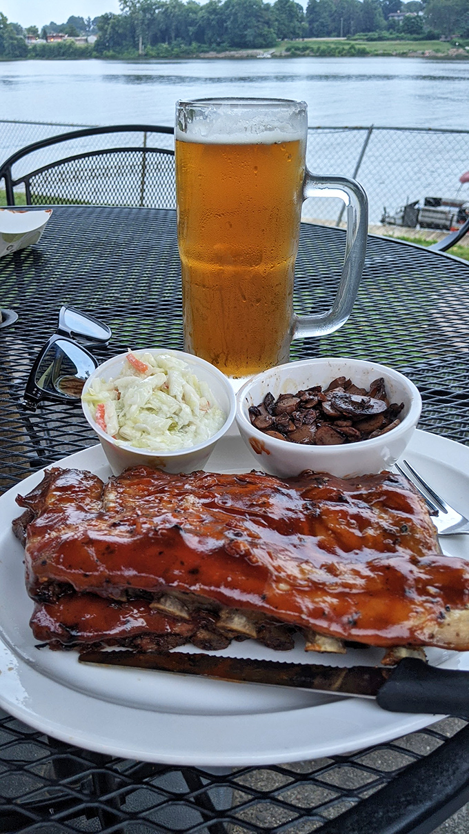 Glistening ribs that pass the "bend test" with flying colors, paired with creamy slaw and a cold beer. River views included at no extra charge.