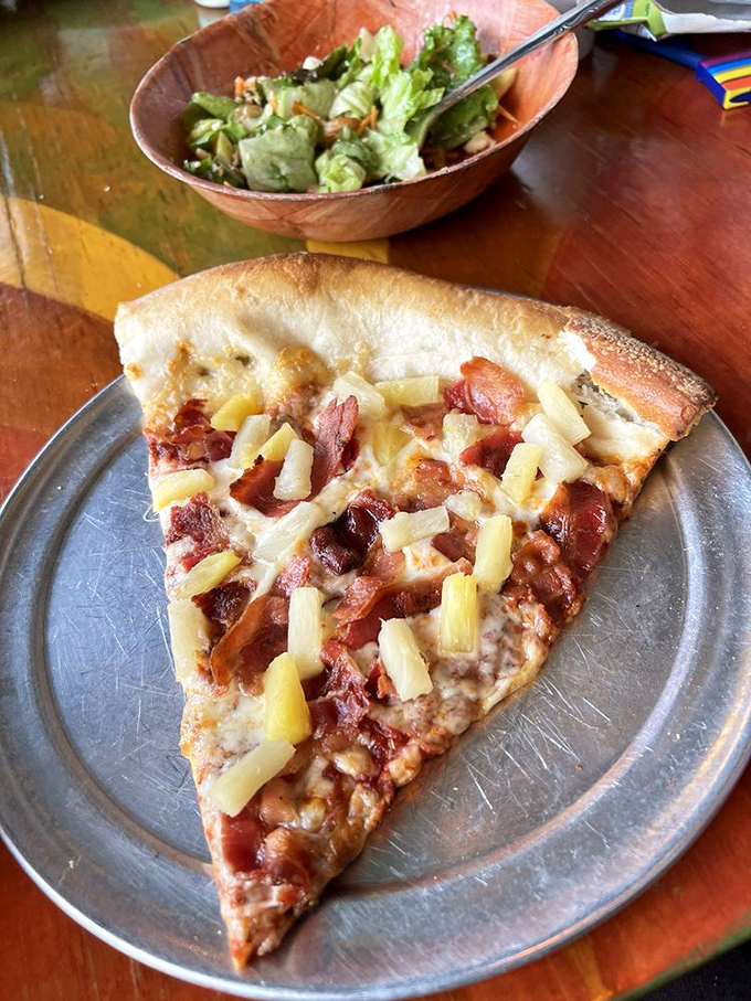 Pizza perfection in its simplest form. The harmonious marriage of salty bacon and sweet pineapple proves that controversial toppings can find peace on a perfect crust.