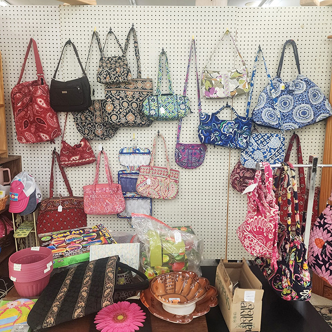 A pegboard paradise of purses where your grandmother's favorite pattern mingles with styles your daughter would actually borrow.