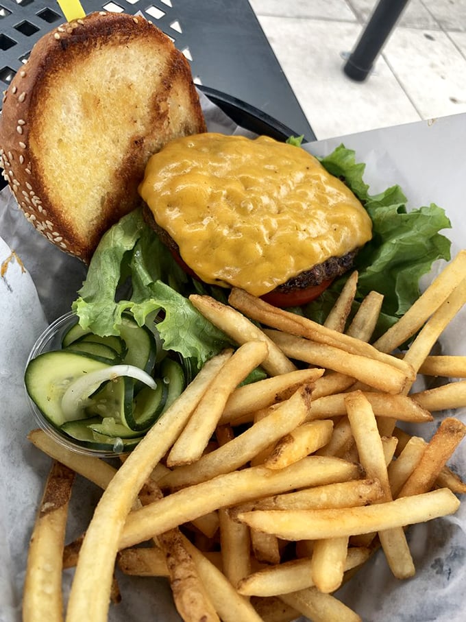This isn't just a cheeseburger&mdash;it's a masterpiece of melted American cheese cascading over perfectly seared Colorado beef, with fries standing by for backup.