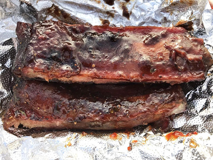 These ribs have that perfect mahogany bark that makes barbecue lovers weak in the knees. Smoke ring so beautiful it deserves its own Instagram account.