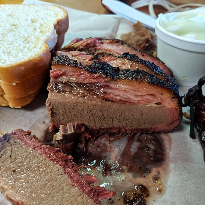 Brisket so perfect it should have its own ZIP code &ndash; that smoke ring is like nature's way of saying "you're welcome."