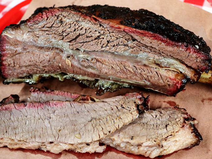 Behold the beef rib&mdash;a prehistoric-looking masterpiece that makes Fred Flintstone's car-tipping portion look like an appetizer. Carnivore nirvana achieved.