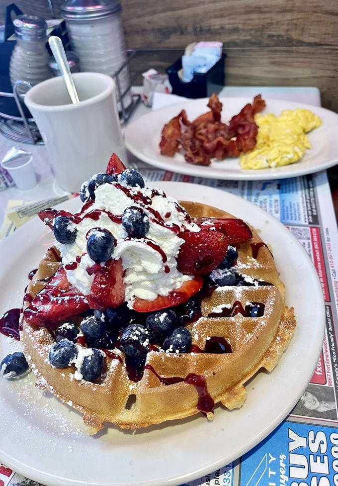 This isn't just a waffle &ndash; it's a throne for berries and cream. The perfect balance of crisp exterior and fluffy interior makes it the breakfast equivalent of winning the lottery.