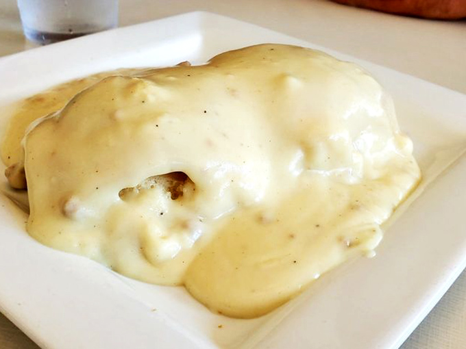 Gravy that flows like lava over a landscape of biscuits. This isn't just breakfast&mdash;it's edible therapy that says "today's gonna be alright."