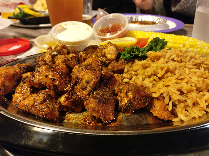 Blackened gator bites &ndash; where Florida's most famous reptile meets its delicious destiny alongside golden rice and sweet corn.