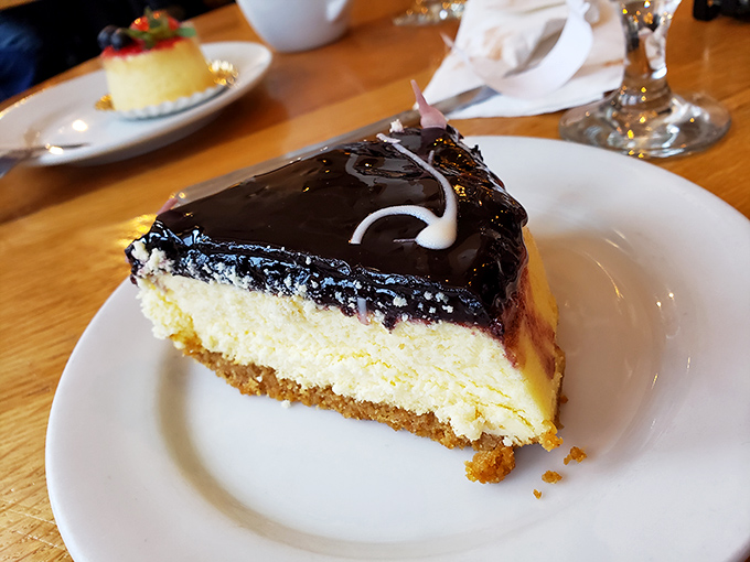 This blueberry-topped cheesecake isn't just dessert&mdash;it's a religious experience with a graham cracker crust congregation and chocolate ganache choir.