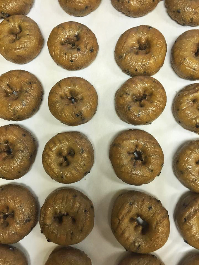 These blueberry cake donuts aren't just baked, they're engineered for maximum joy. Each one packs more flavor than should legally be allowed in something this size.