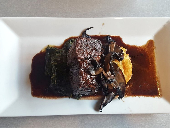 The short ribs don't just fall off the bone &ndash; they practically leap onto your fork, swimming in a sauce so rich it could buy a yacht.