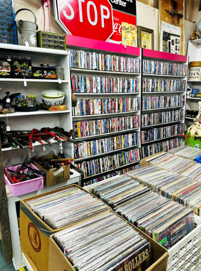 Analog entertainment in a digital world&mdash;rows of DVDs and vinyl records await collectors who know the joy of physical media.
