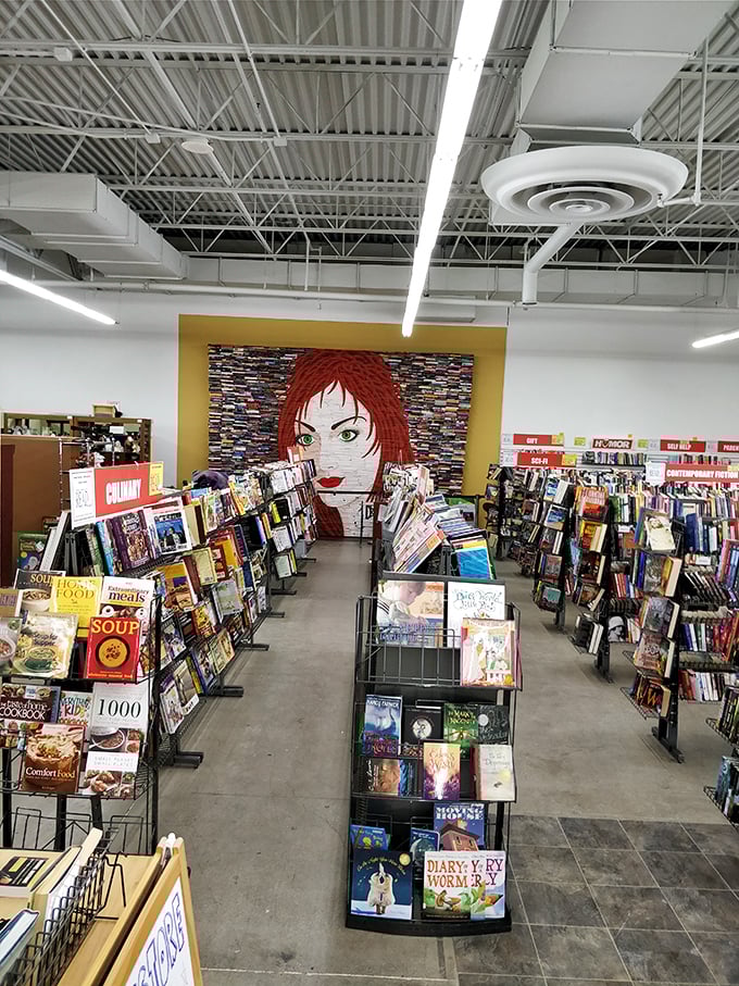 That striking book mural watches over literary treasures like a guardian of forgotten stories and adventures.