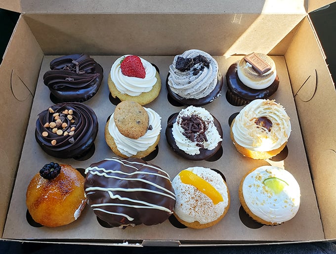 A dozen reasons to skip dinner altogether. This box of assorted cupcakes represents the full spectrum of dessert possibilities, from fruit-topped to chocolate-drenched.