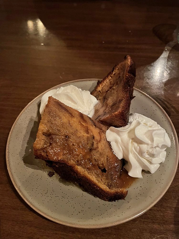 Bread pudding that could make a dessert skeptic weep with joy. That golden crust, that tender interior, those dollops of cream&mdash;resistance is futile.