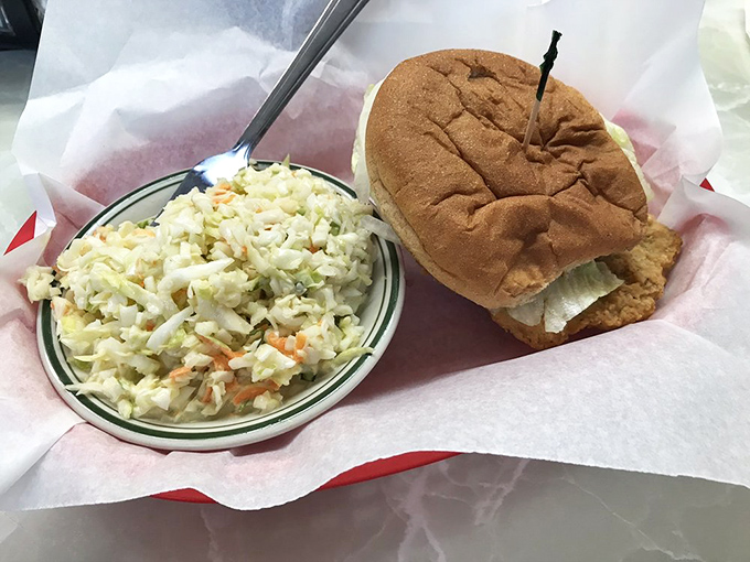 A proper tenderloin sandwich requires its own area code&mdash;crispy, oversized, and making that bun work overtime like it owes it money.