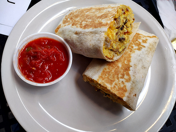 This breakfast burrito isn't messing around. Packed with eggs, cheese, and goodness, it's the morning hero you deserve after surviving Monday.