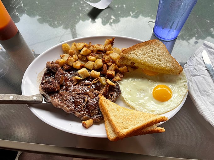 A breakfast trinity of perfectly seared steak, golden home fries, and sunny-side-up eggs&mdash;the morning equivalent of hitting the Pennsylvania lottery.