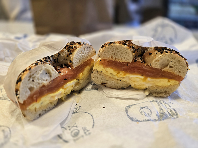Breakfast sandwich perfection: layers of smoky salmon and egg create what I call "morning architecture"—building a better day one bite at a time.