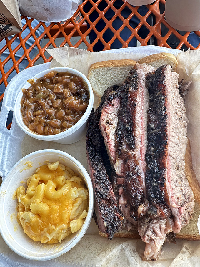Brisket with that perfect smoke ring, mac and cheese that's pure comfort, and Brunswick stew that could make a Georgian weep with joy.