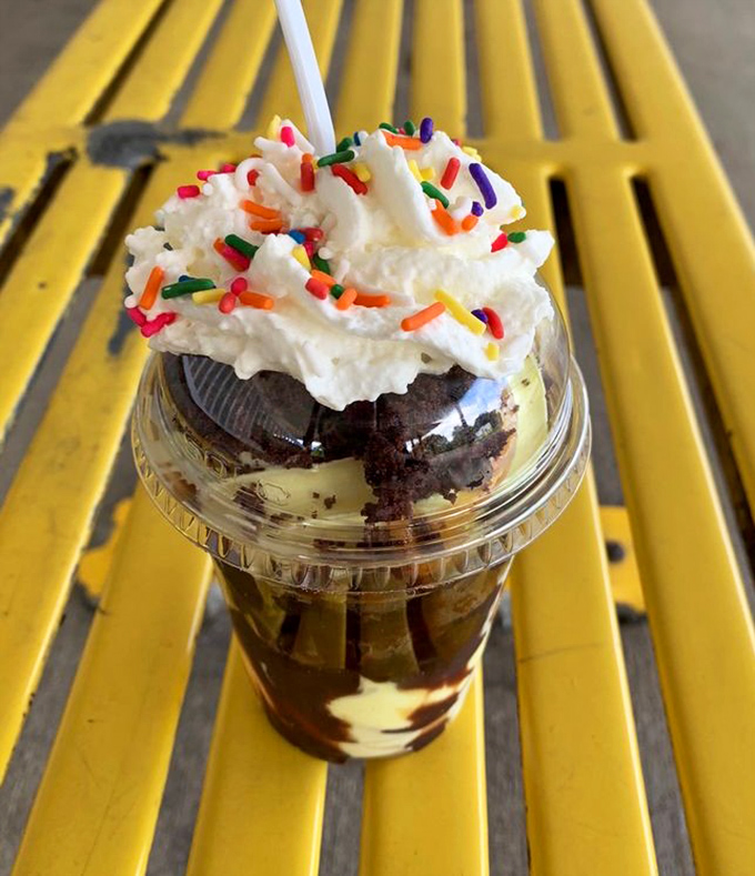 Brownie meets custard in a cup of pure joy. The sprinkles aren't just decoration&mdash;they're confetti celebrating this perfect union.