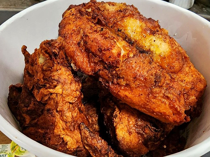 Golden-brown perfection in a bowl. Each piece of chicken wears its crust like a badge of honor earned in the fryer.