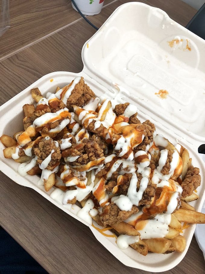 Buffalo chicken fries that deliver wing flavor without the mess. Your fingers stay clean while your soul gets dirty.