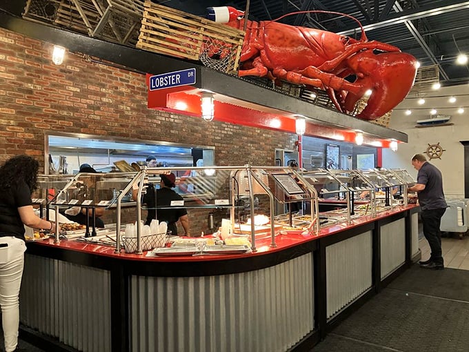 This buffet line isn't just a food station&mdash;it's where dreams come true, complete with that magnificent red sentinel keeping watch overhead.