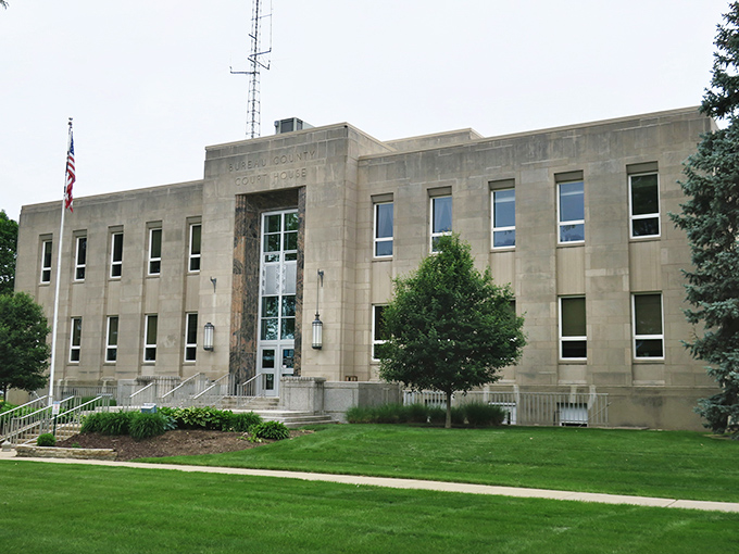 The Bureau County Courthouse commands respect with its sturdy Art Deco lines, a testament to an era when public buildings were designed to inspire civic pride.