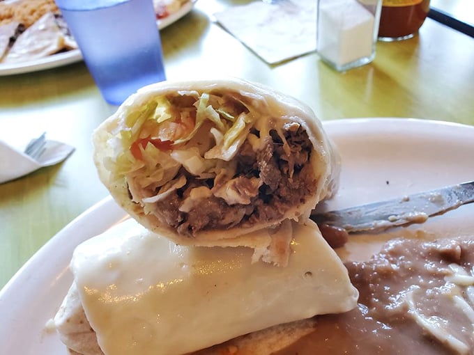 Behold the cross-section of perfection! Like a geologist examining precious layers, you'll appreciate how each ingredient in this burrito plays its essential role.