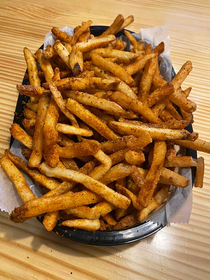 Golden, crispy, and perfectly seasoned—these fries aren't just a side dish, they're the supporting actor that steals the show.