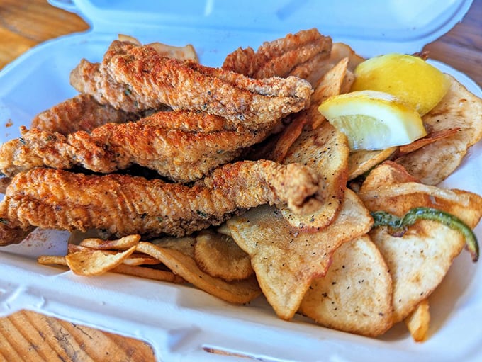 Golden-fried catfish that shatters with each bite, paired with house-made chips. This isn't just lunch&mdash;it's an edible North Carolina postcard.