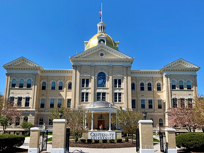 Centenary University's grand main building stands as an architectural crown jewel of Hackettstown. Its golden dome gleams in the sunlight, a beacon of learning since the 19th century.