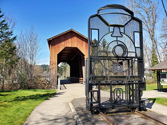 Not just any covered bridge&mdash;this wooden time machine comes complete with its own locomotive sculpture, a steampunk fantasy in real life.