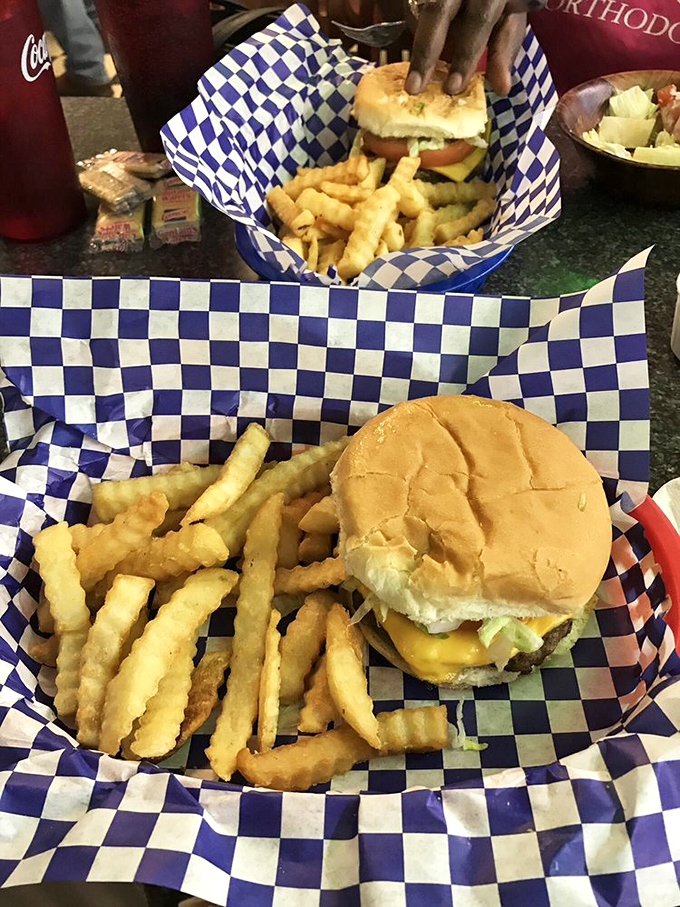 A proper diner cheeseburger doesn't need fancy frills&mdash;just a perfectly toasted bun, melty cheese, and a basket of crispy fries to complete the symphony.